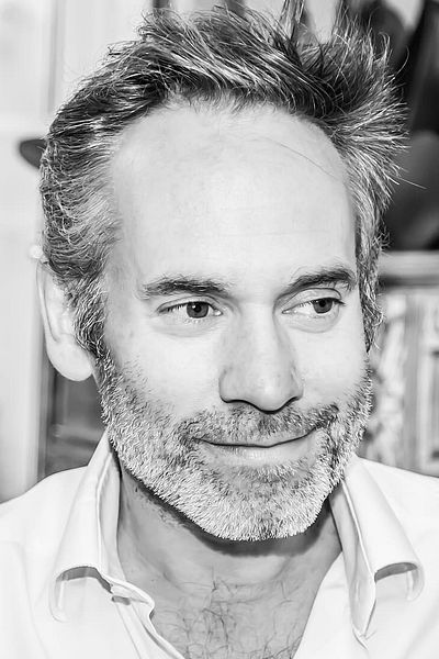 Dominic Frisby - About - Entertainment.ie