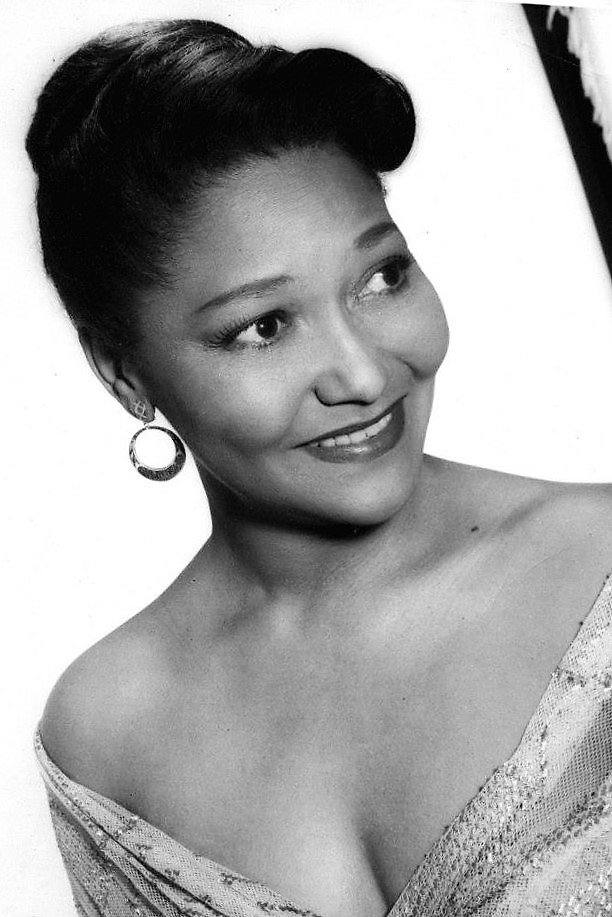 Maidie Norman - About - Entertainment.ie